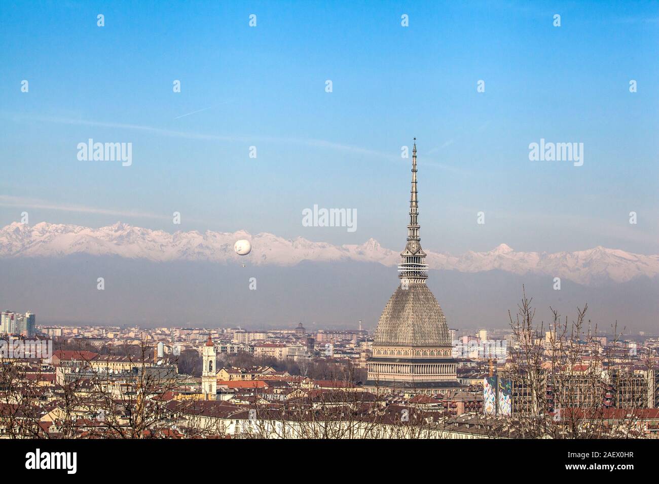 Turin Alps Skyline. View Over the city with rooftops and La Mole ...