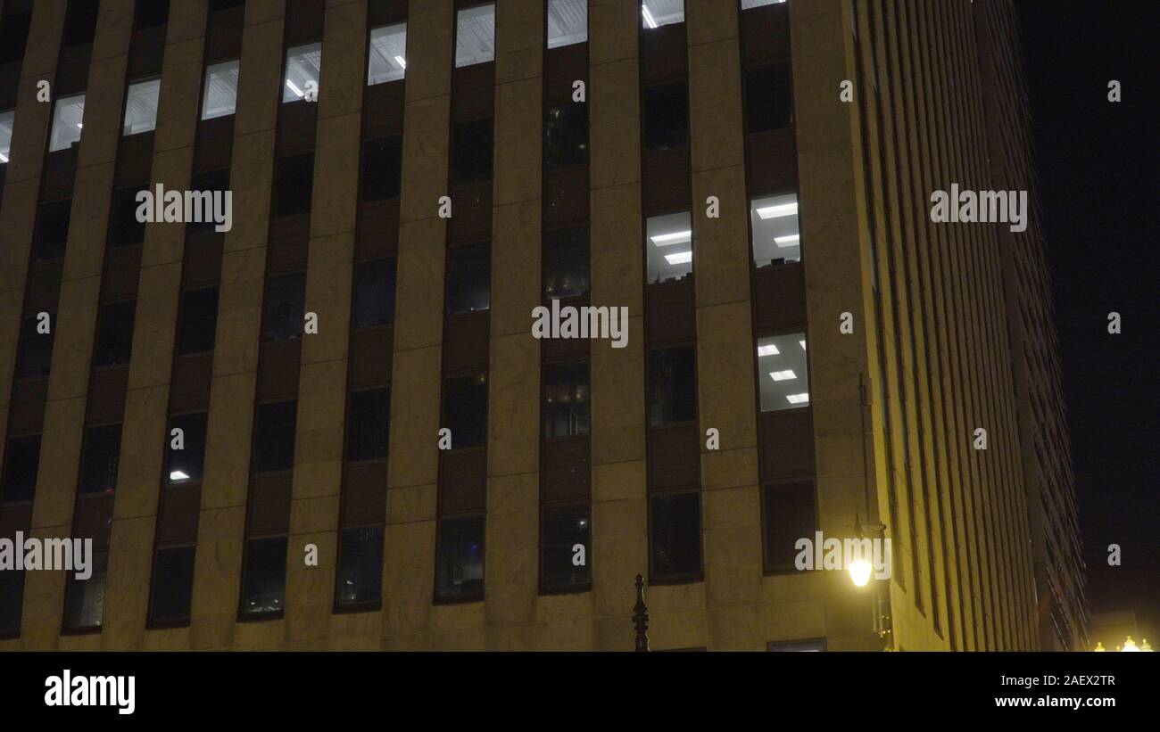 Night time exterior establishing shot of a generic apartment or office ...