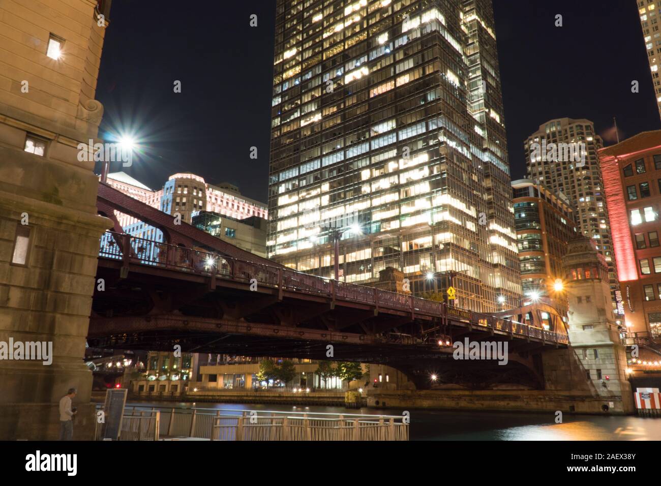 Beautiful night time establishing shot view of downtown Chicago bridge ...