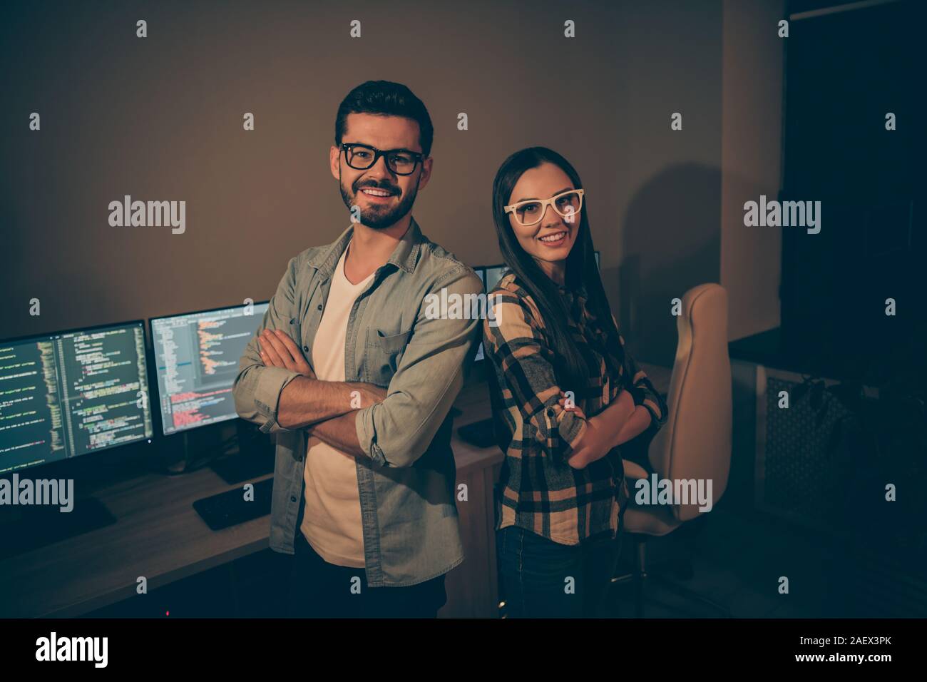 Photo of it specialist guy lady two business people night coworking ...