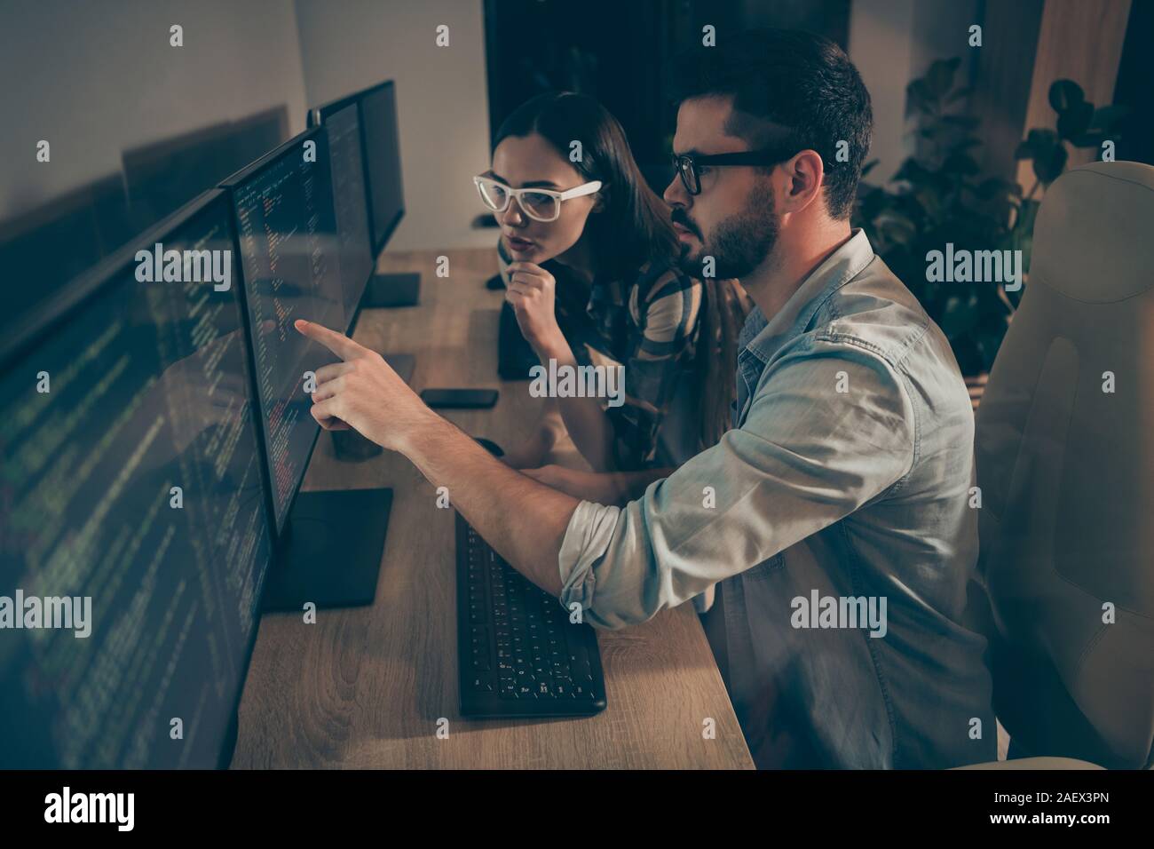 Profile photo of it specialist two serious guy lady business people ...