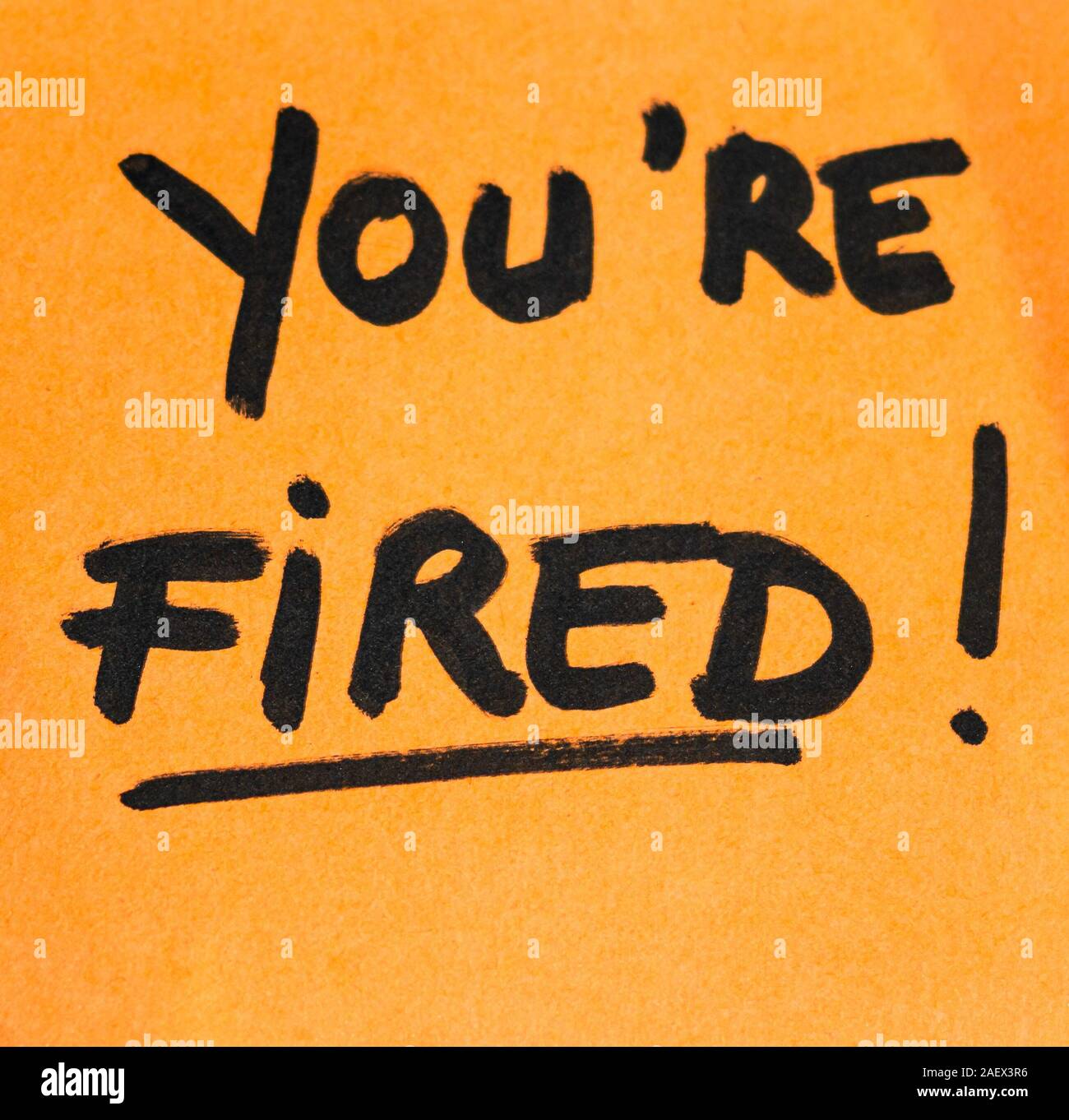 Writing on colorful sticky note you are fired. Text with you are fired ...