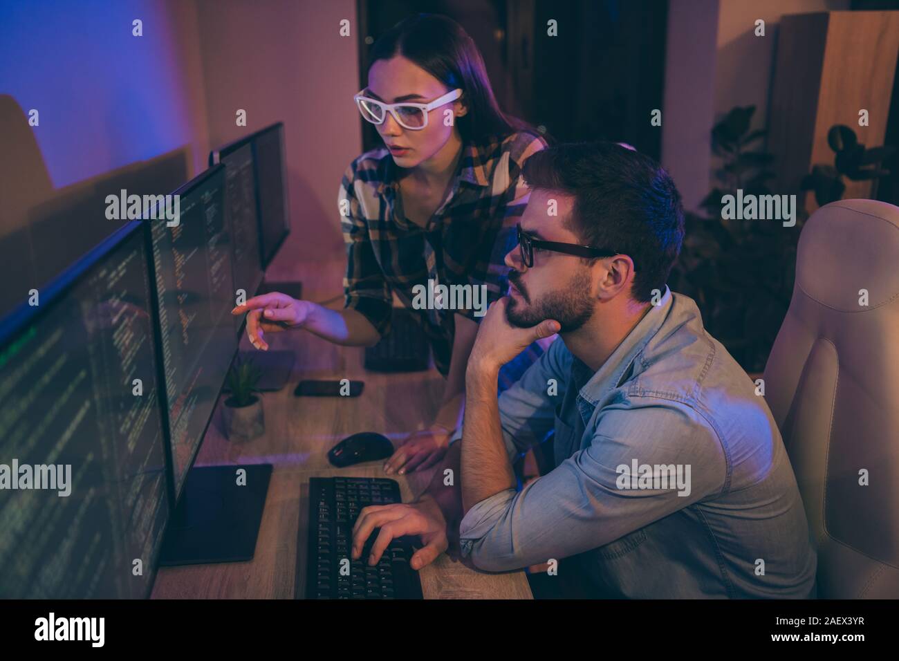 Profile photo of it specialist two serious guy lady business people ...