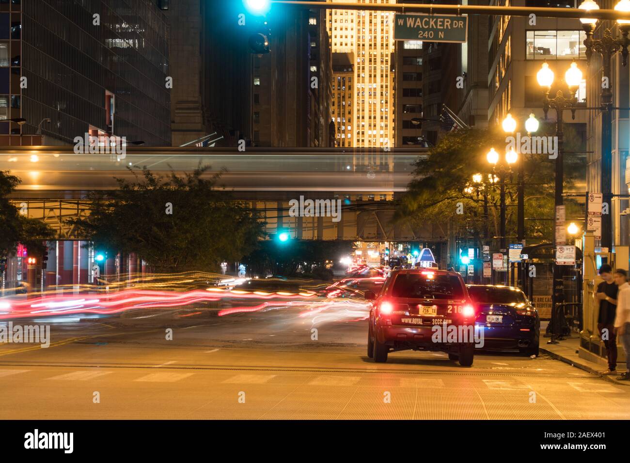 Chicago, IL - Circa 2019: Night time long exposure downtown as busy car ...