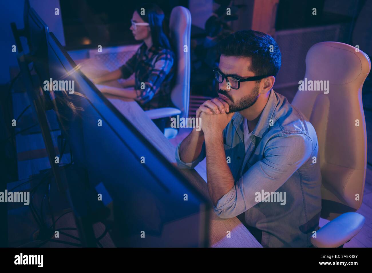 Photo of it specialist two guy lady business people sitting late night ...