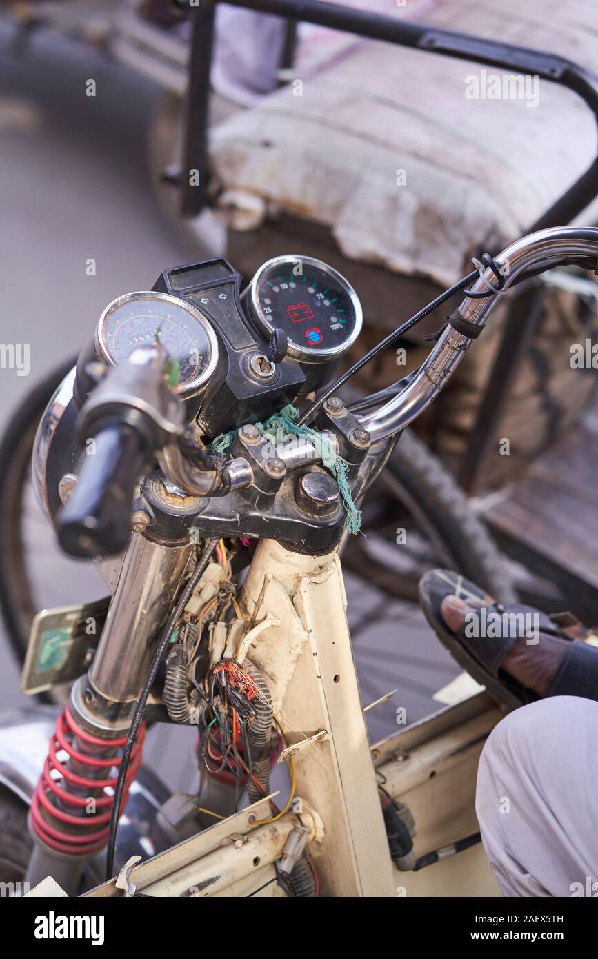 The front of a rickshaw in India with wires and rust Stock Photo - Alamy