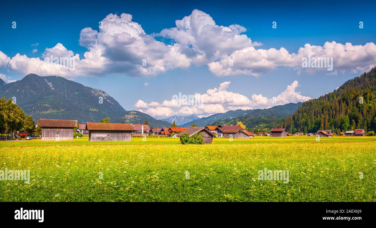 Sunny summer view of Garmisch-Partenkirchen mountain resort town in ...
