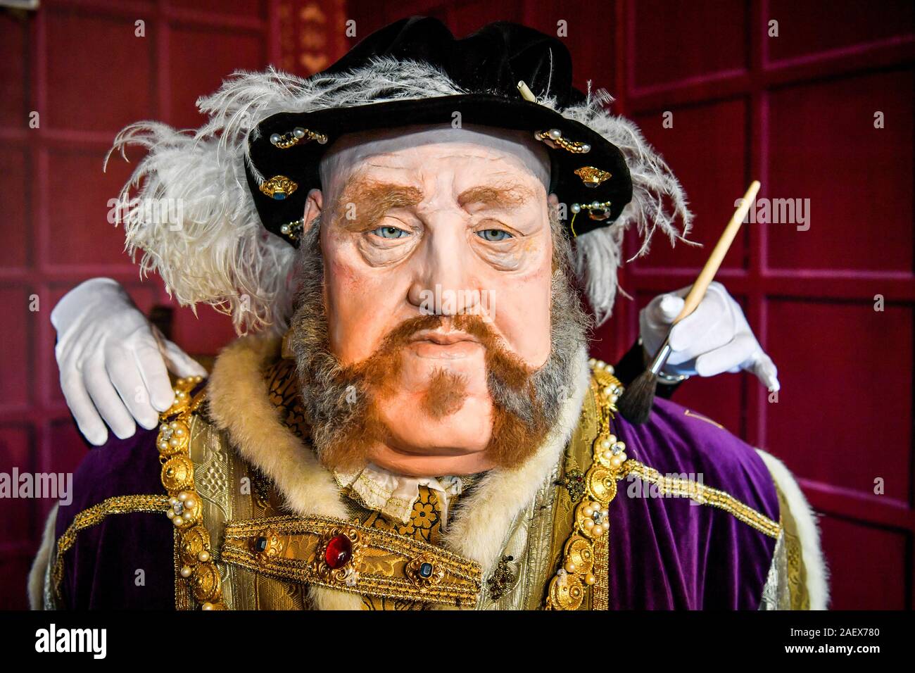 A life size mannequin of King Henry VIII, is gently brushed and cleaned ...