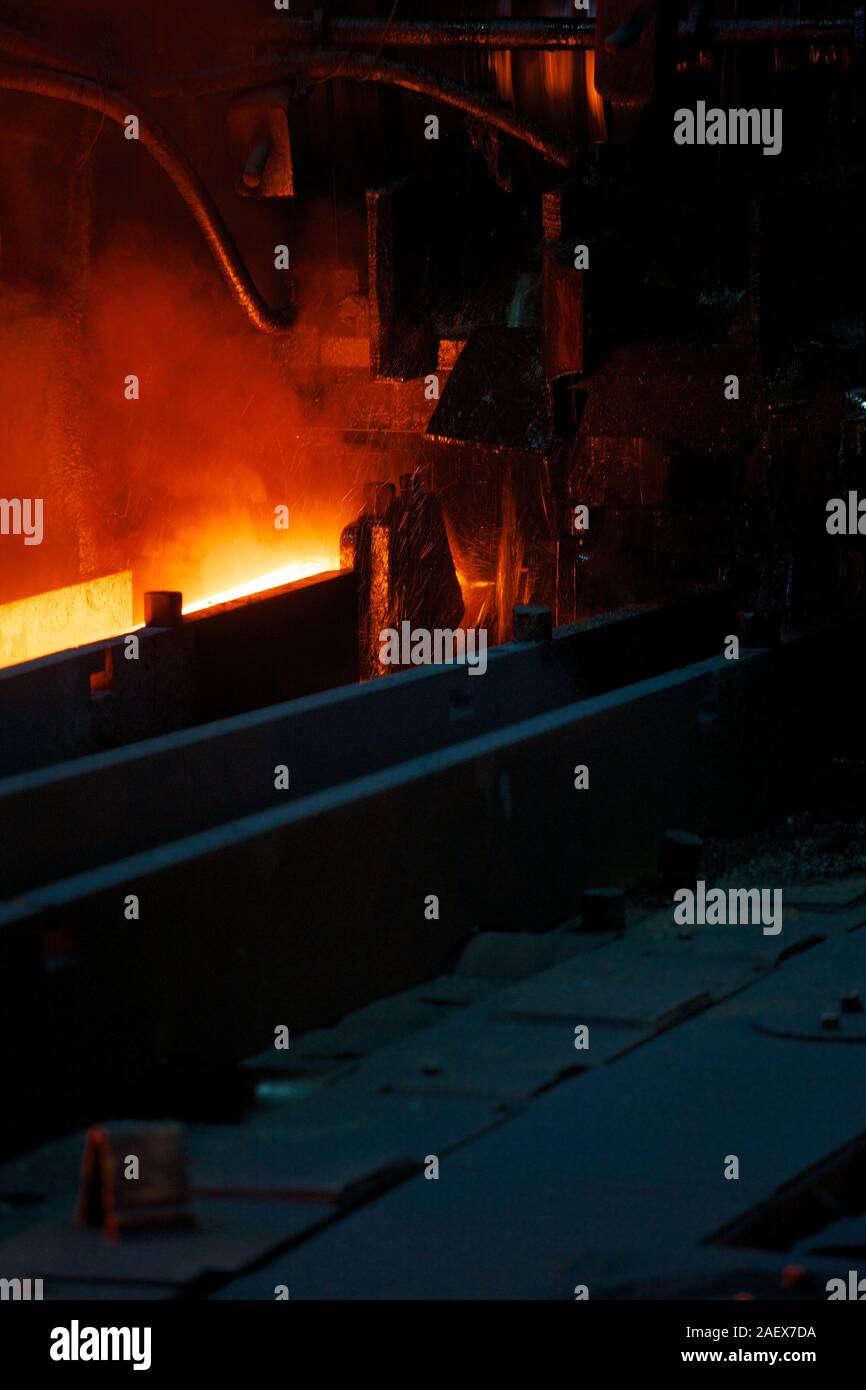 Pouring pig iron into the ironworks Stock Photo - Alamy