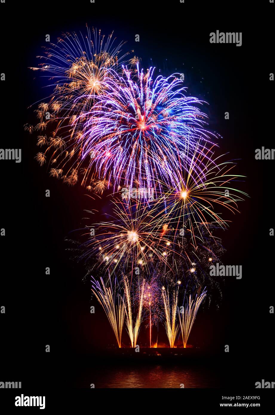 Marvelous multi-colored fireworks display on black background ...