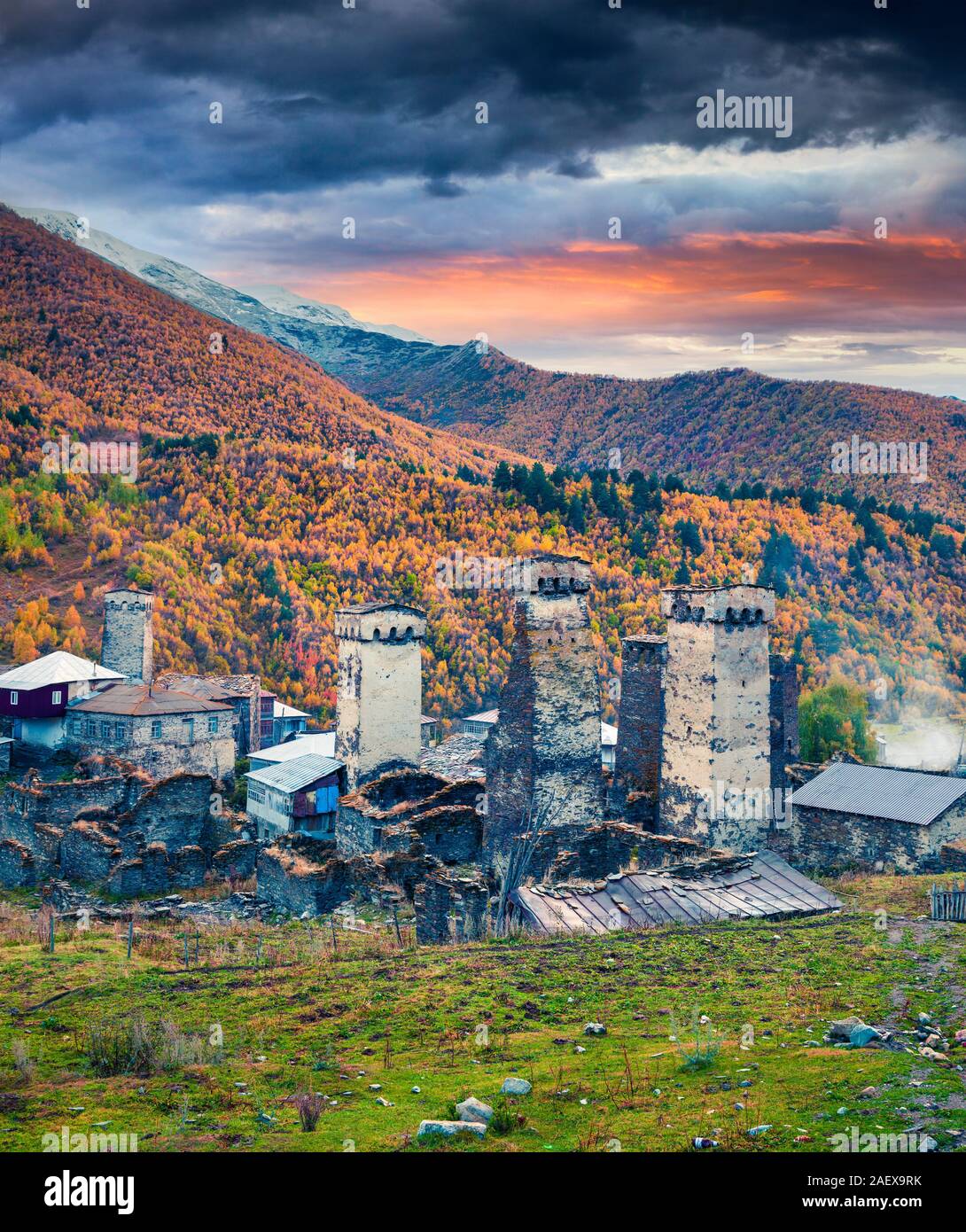 Dramatic autumn sunset in the famous highest inhabited village in ...