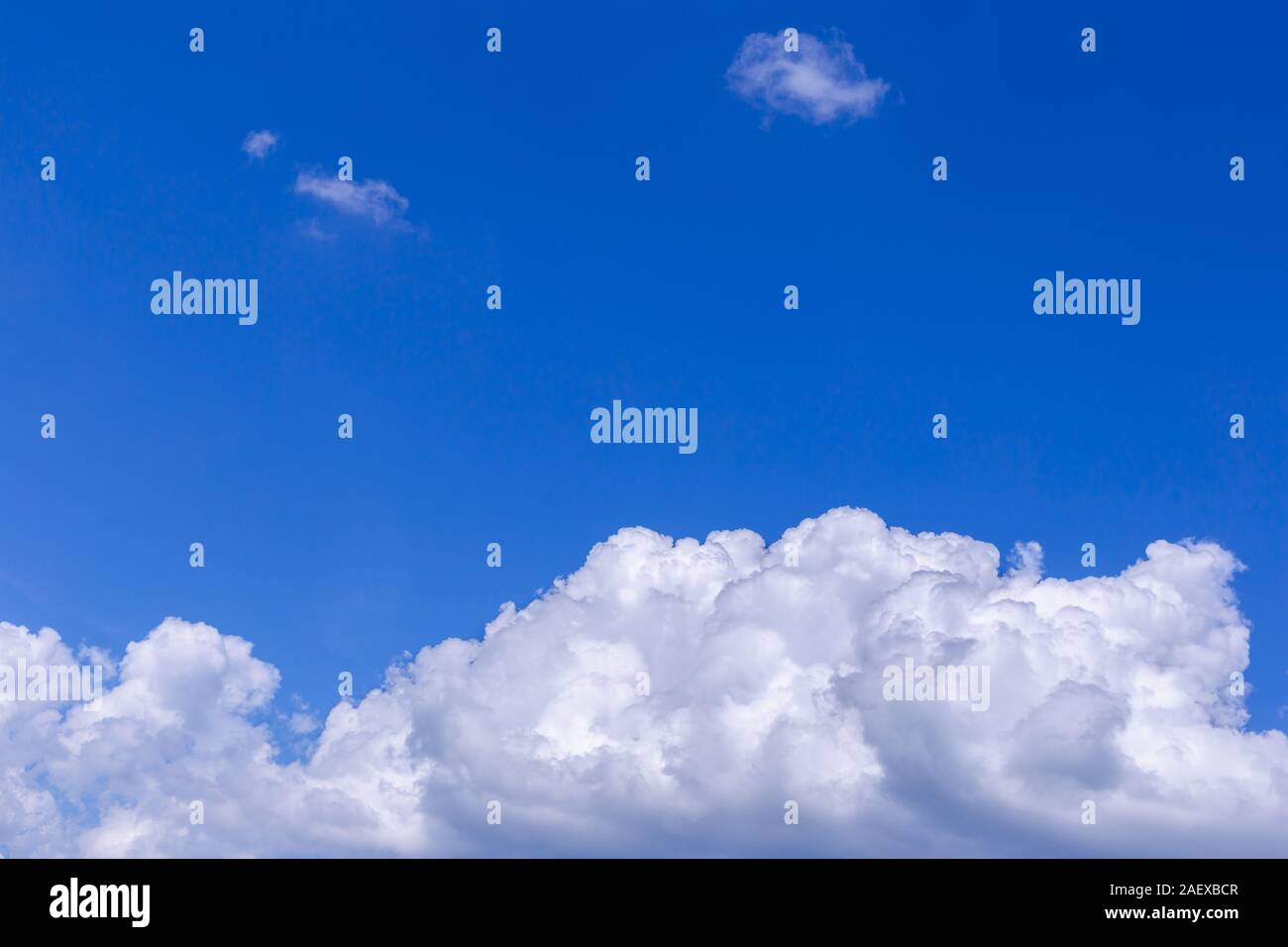 Blue sky background with tiny clouds for graphic design or website ...