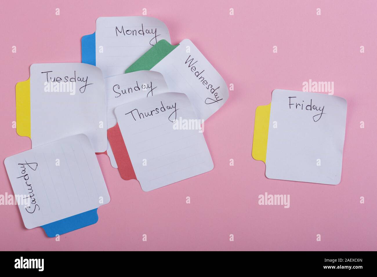 The days of the week - the paper stickers attached to the pink ...