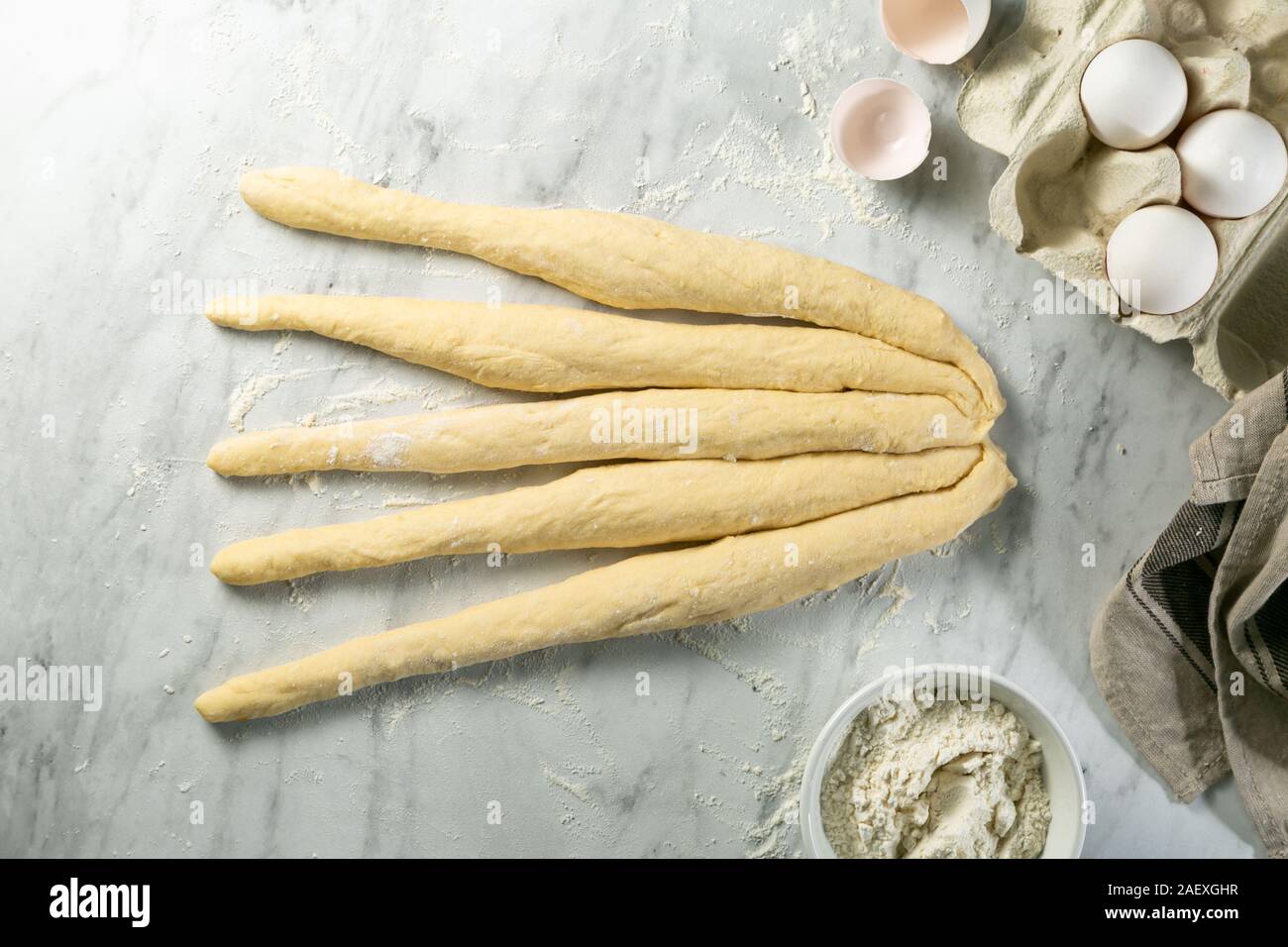 Making traditional jewish challah bread on marble background Stock ...
