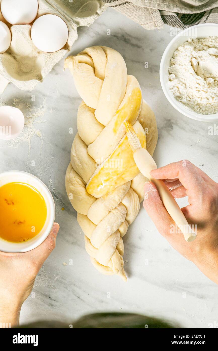 Making traditional jewish challah bread on marble background Stock ...
