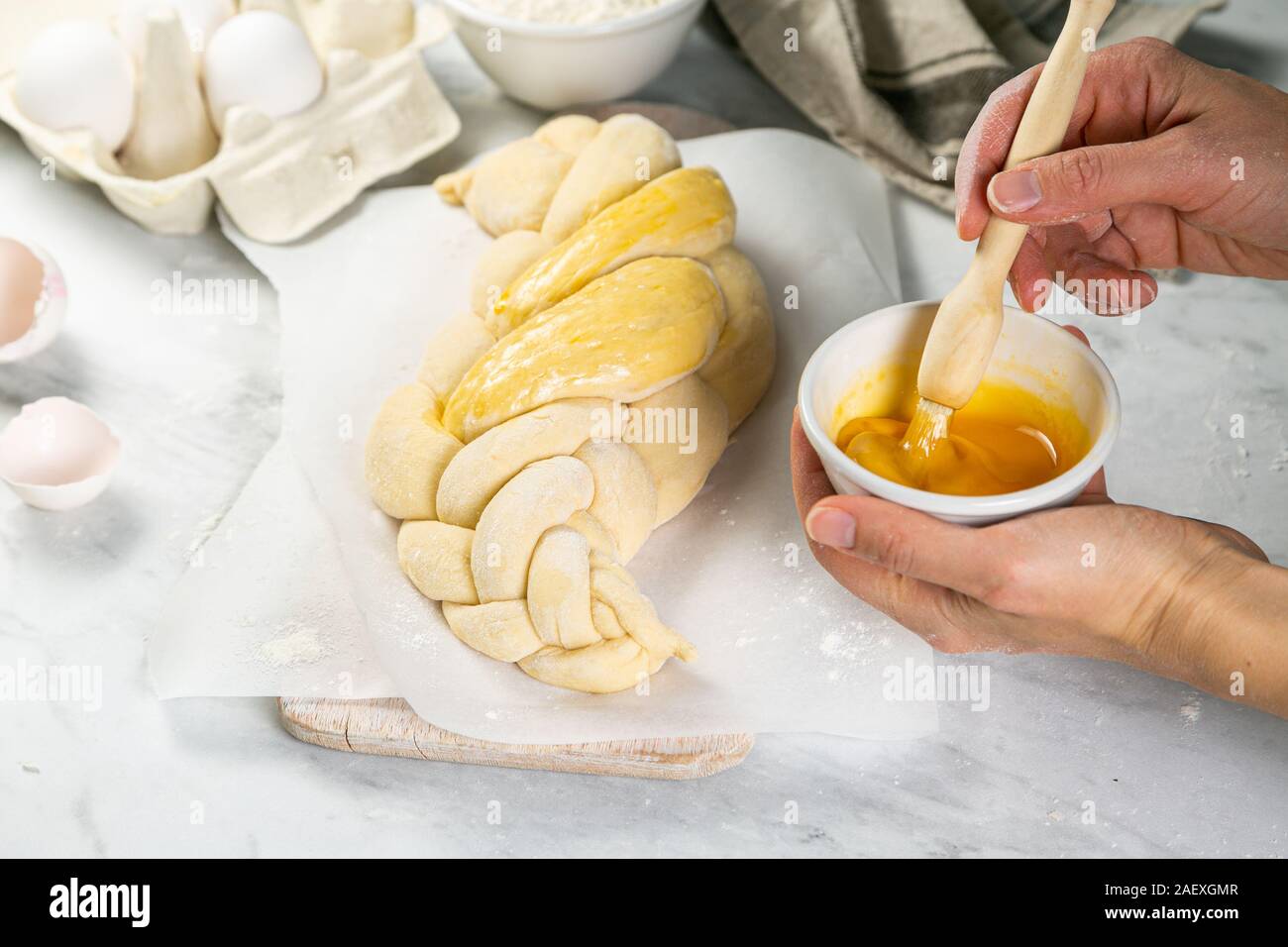 Making traditional jewish challah bread on marble background Stock ...