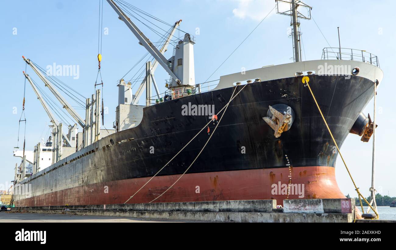 Commercial Ship or vessel at international harbor for logistics ...
