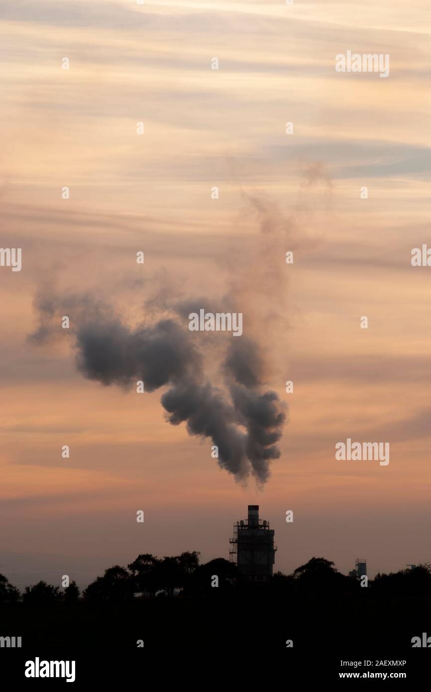 smoke and pollution coming out of factory Stock Photo - Alamy