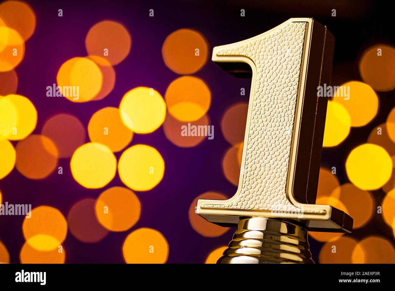 Ist place winners award trophy with gold number Stock Photo - Alamy