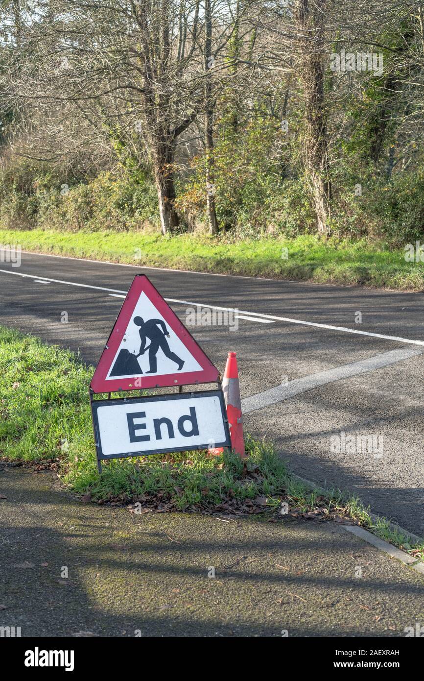 Roadworks Men at Work warning sign on roadside footpath in Lostwithiel ...