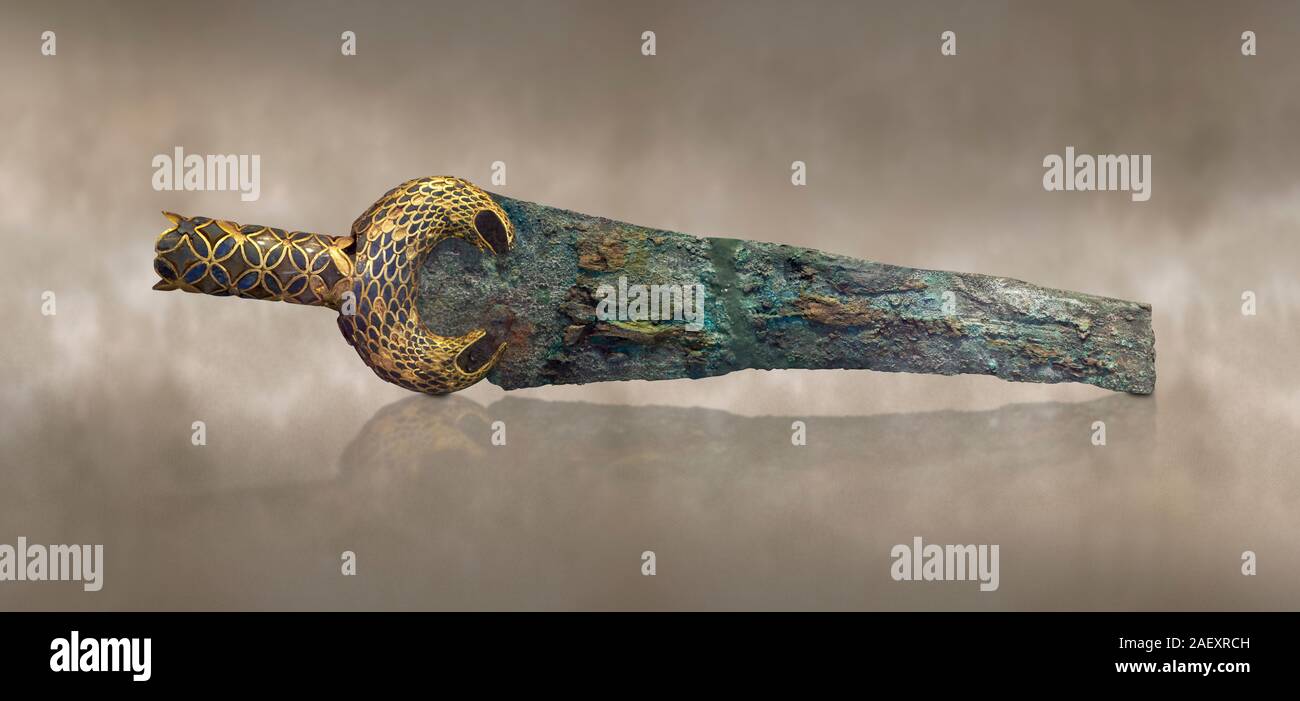 Mycenaean Bronze dagger with inlaid lion hunt scene from Grave V, Grave ...