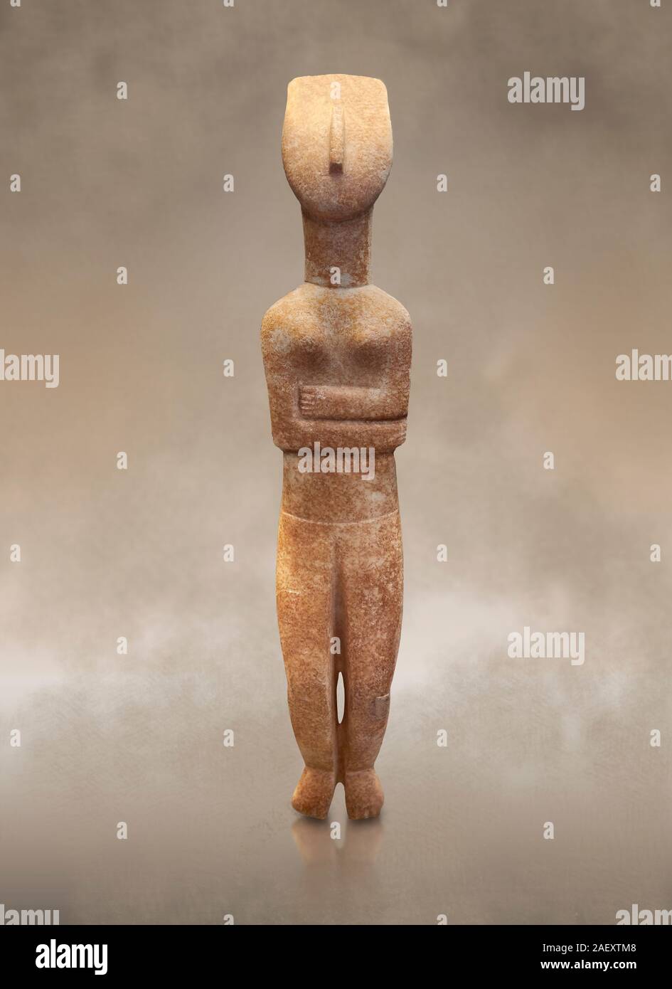 Female Cycladic statue figurine with folded arms of the Spedos and ...
