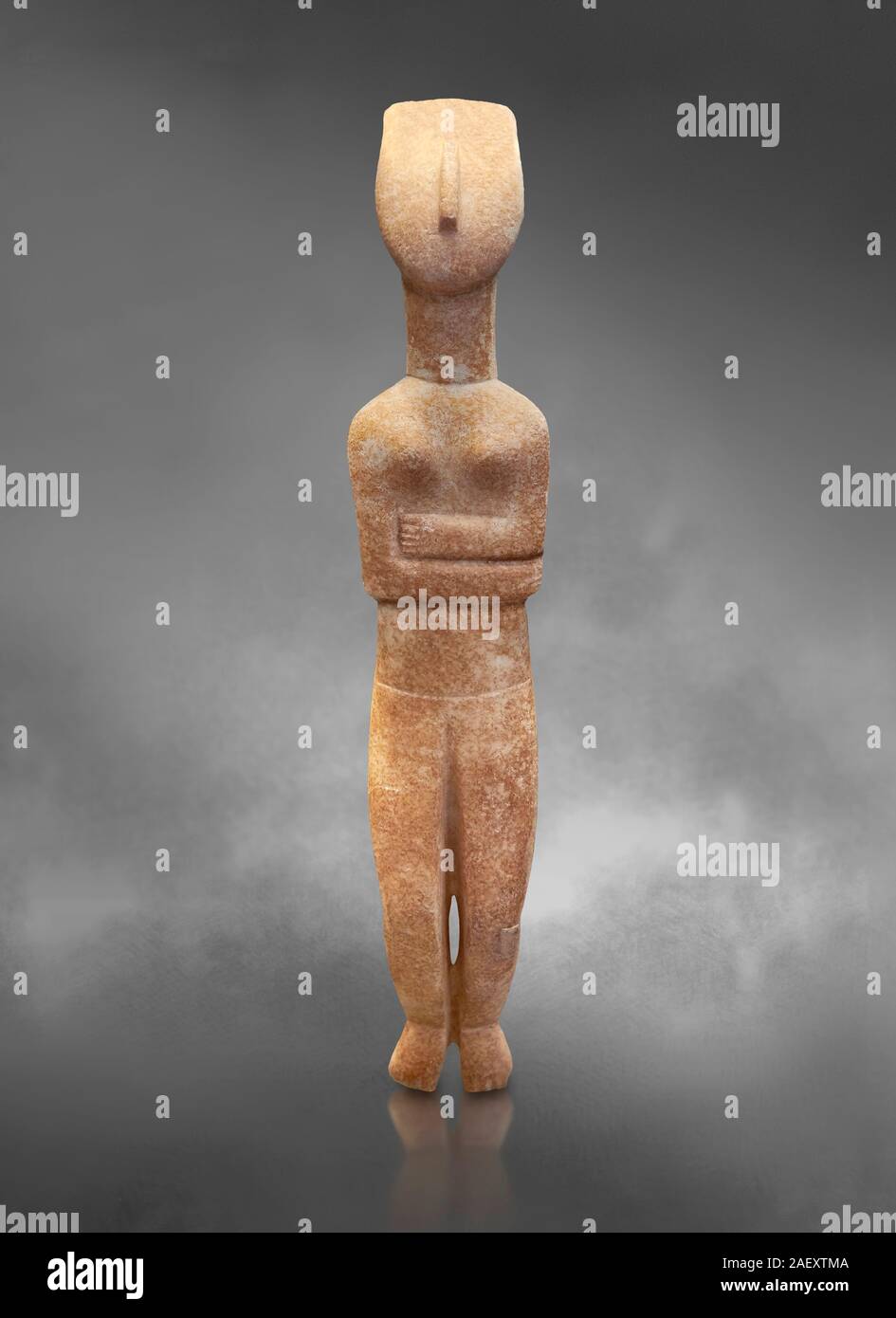 Female Cycladic statue figurine with folded arms of the Spedos and ...