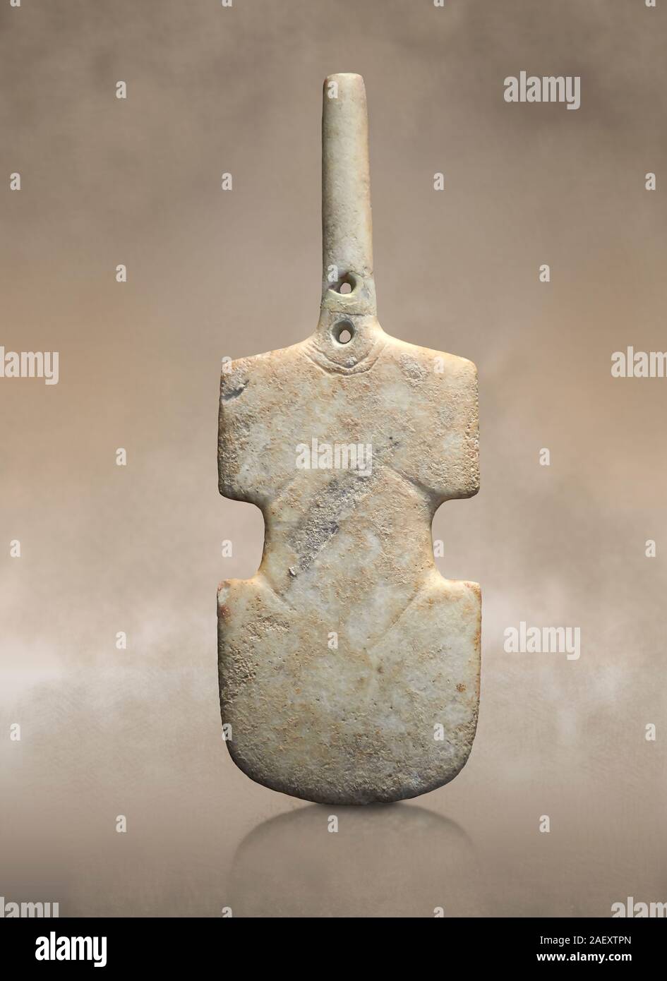 Cycladic violin shaped figurine. Early Cycladic Period I (Grotta-Pelos ...