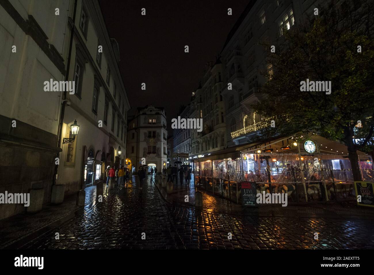PRAGUE, CZECHIA - NOVEMBER 3, 2019: Karlova street by night with ...