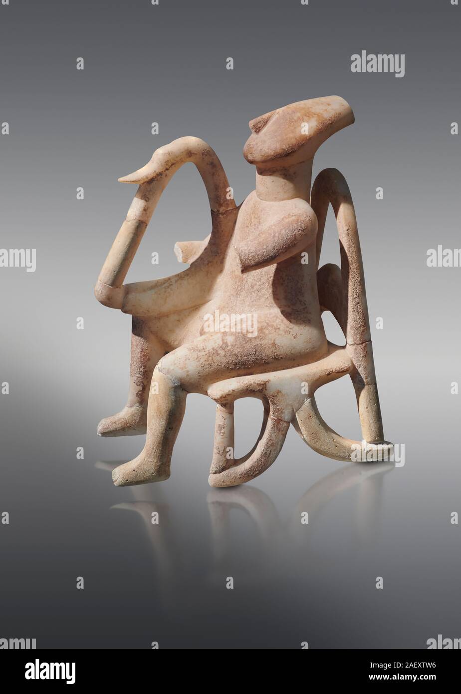 The 'Harpist of Keros' a seated parian marble female Cycladic figurine ...