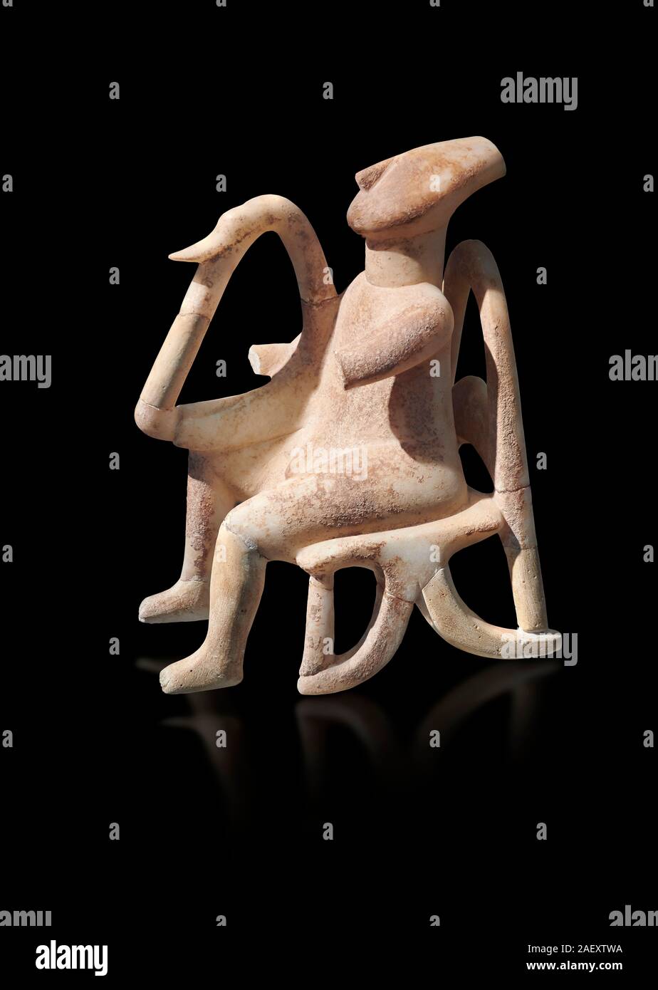 The 'Harpist of Keros' a seated parian marble female Cycladic figurine ...