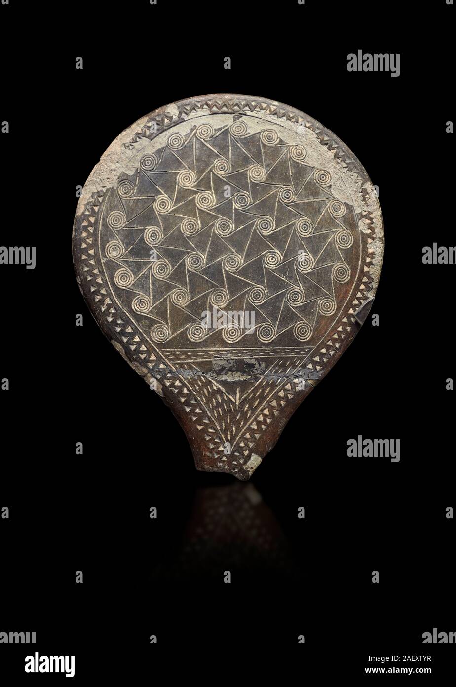 Cycladic terracotta 'frying pan' with incied spiral decoration from ...