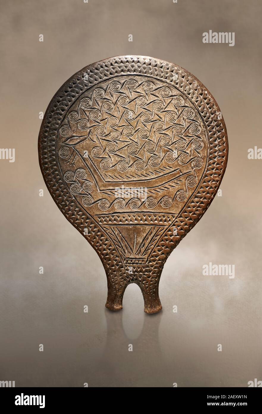 Cycladic terracotta 'frying pan' with incied boat and spiral decoration ...