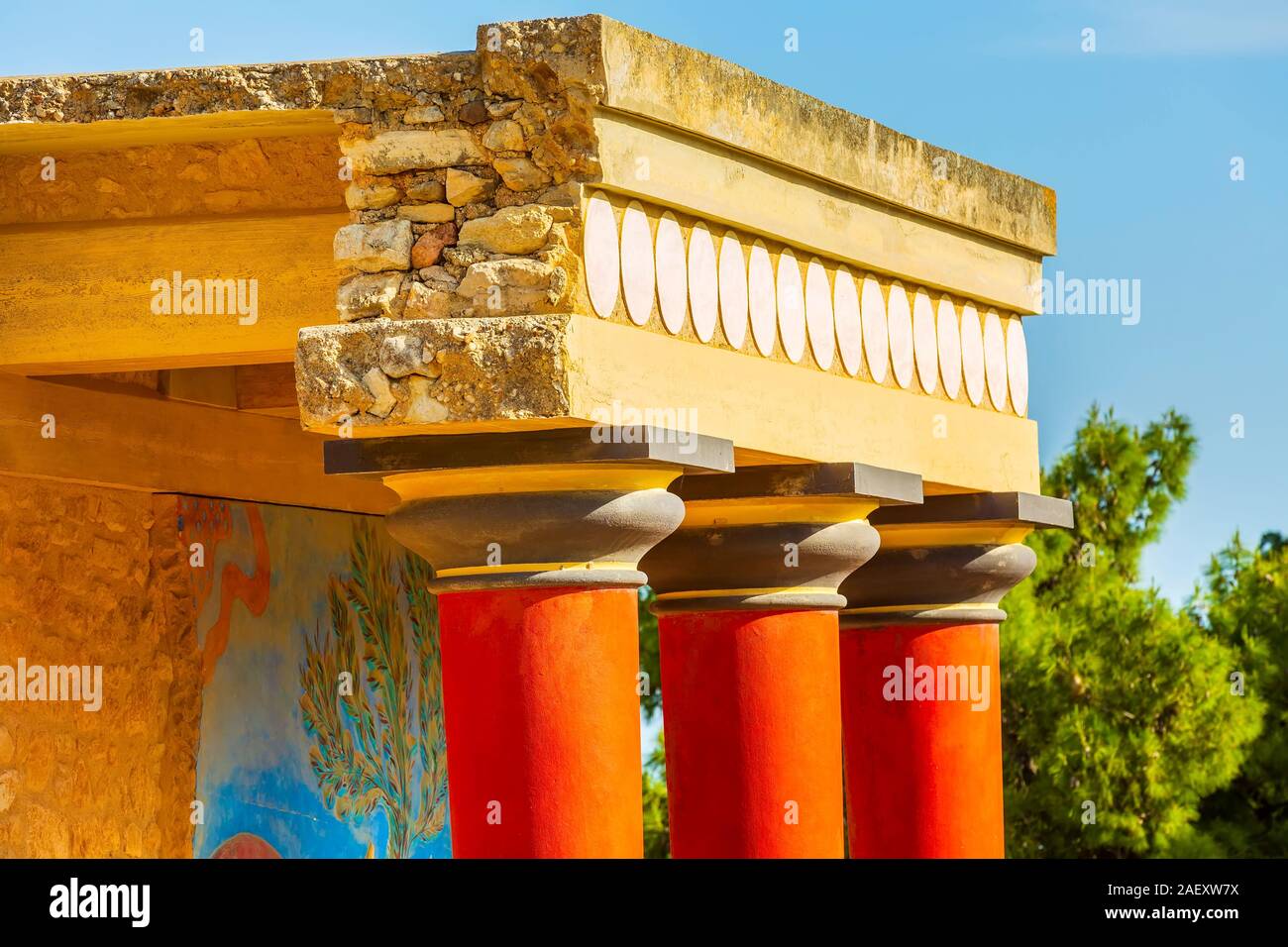 Close-up red columns, North Entrance of ancient Minoan Palace in ...