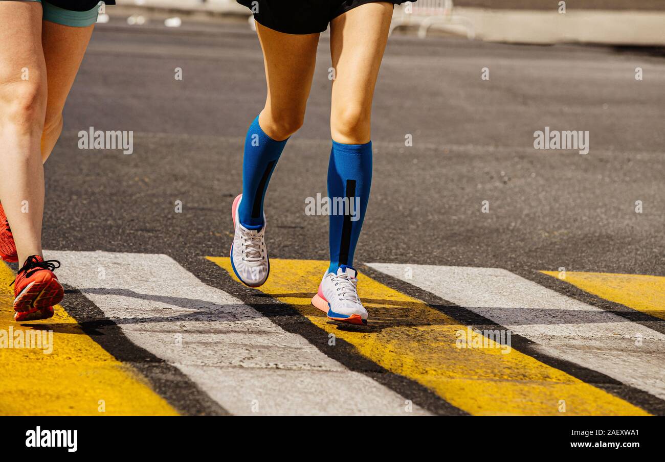 Jogger crossing road hi-res stock photography and images - Alamy