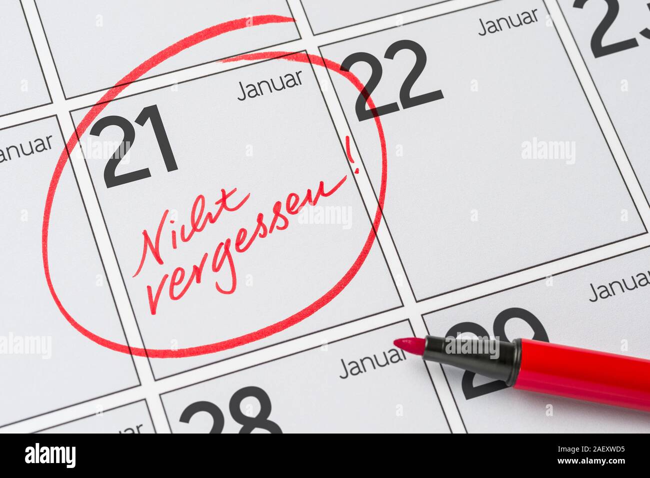 Save the Date written on a calendar - January 21 - Nicht vergessen in ...