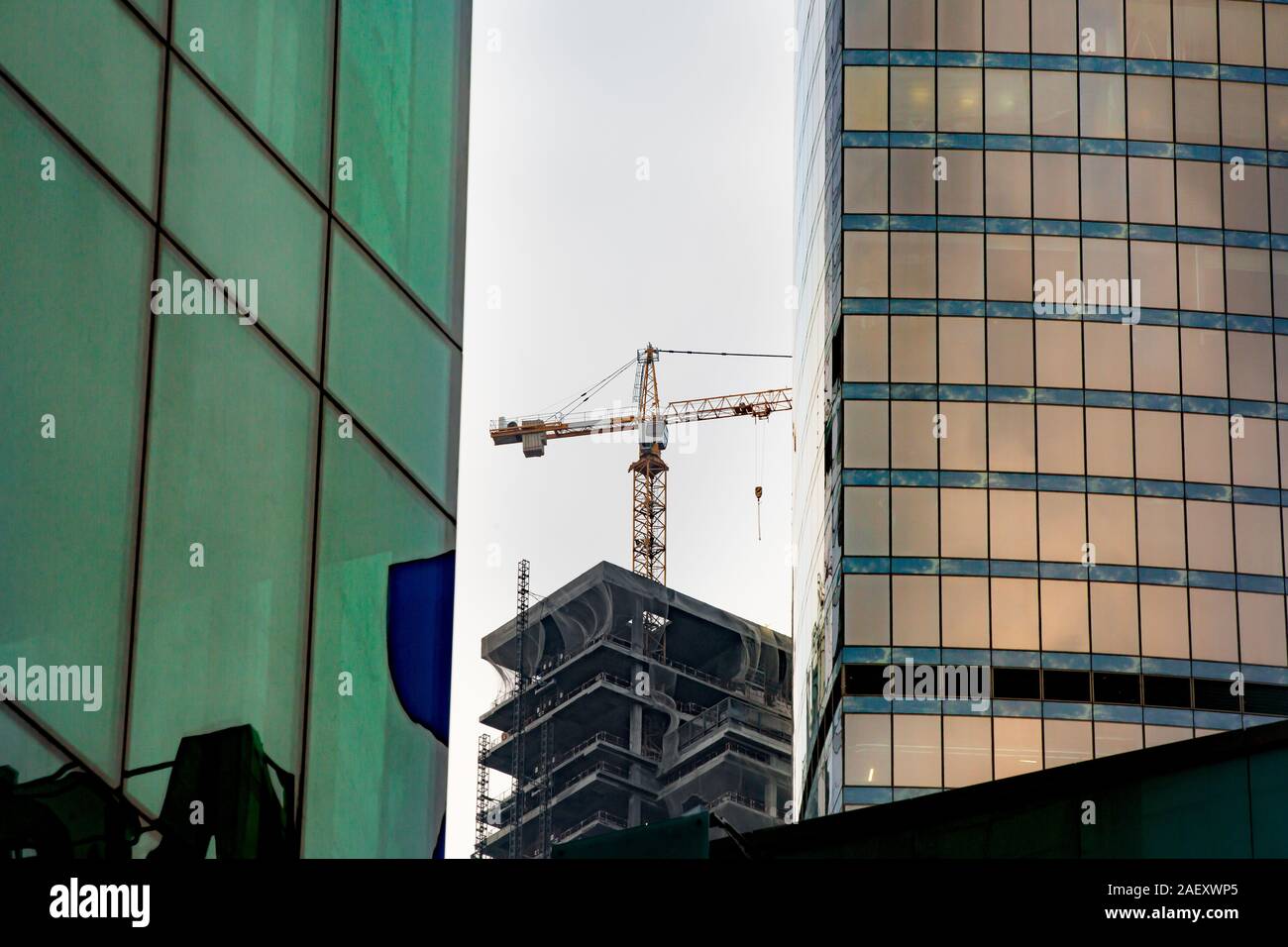 A fragment of a construction site on the background of two modern ...