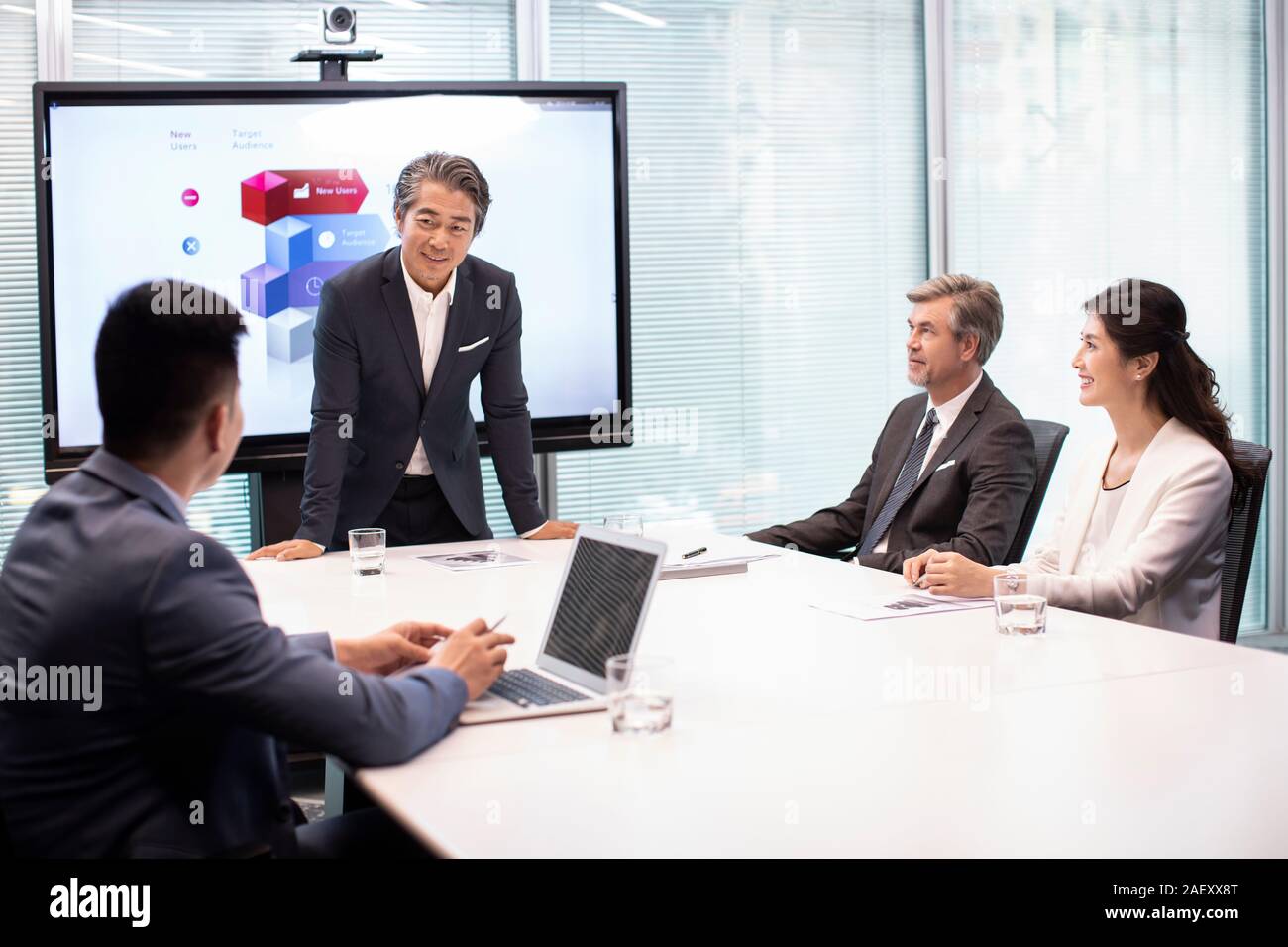 Business people having meeting in conference room Stock Photo - Alamy