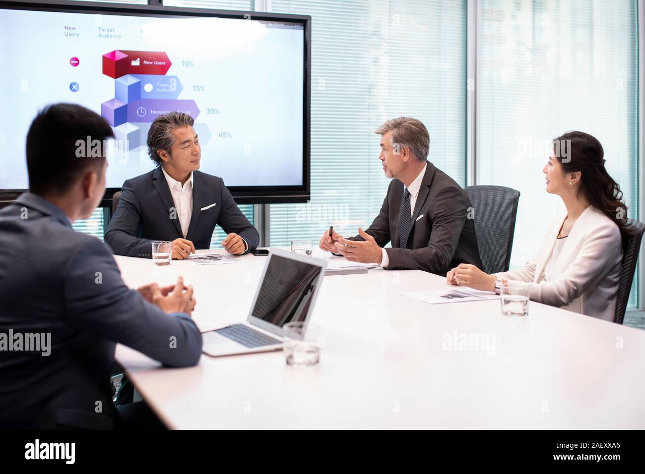 Business people talking in conference room Stock Photo - Alamy