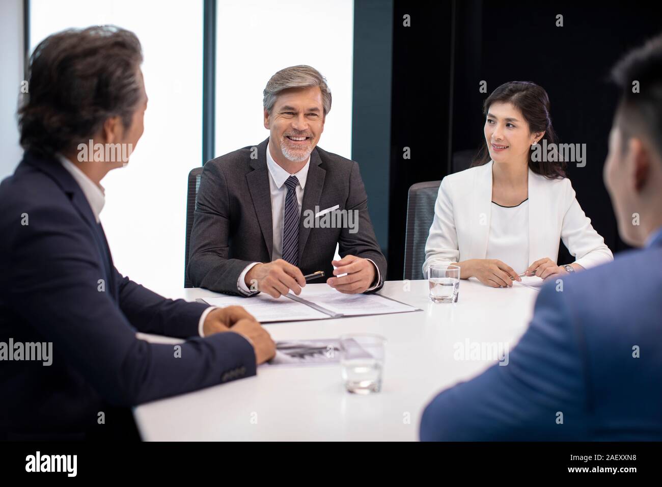 Business people talking in conference room Stock Photo - Alamy