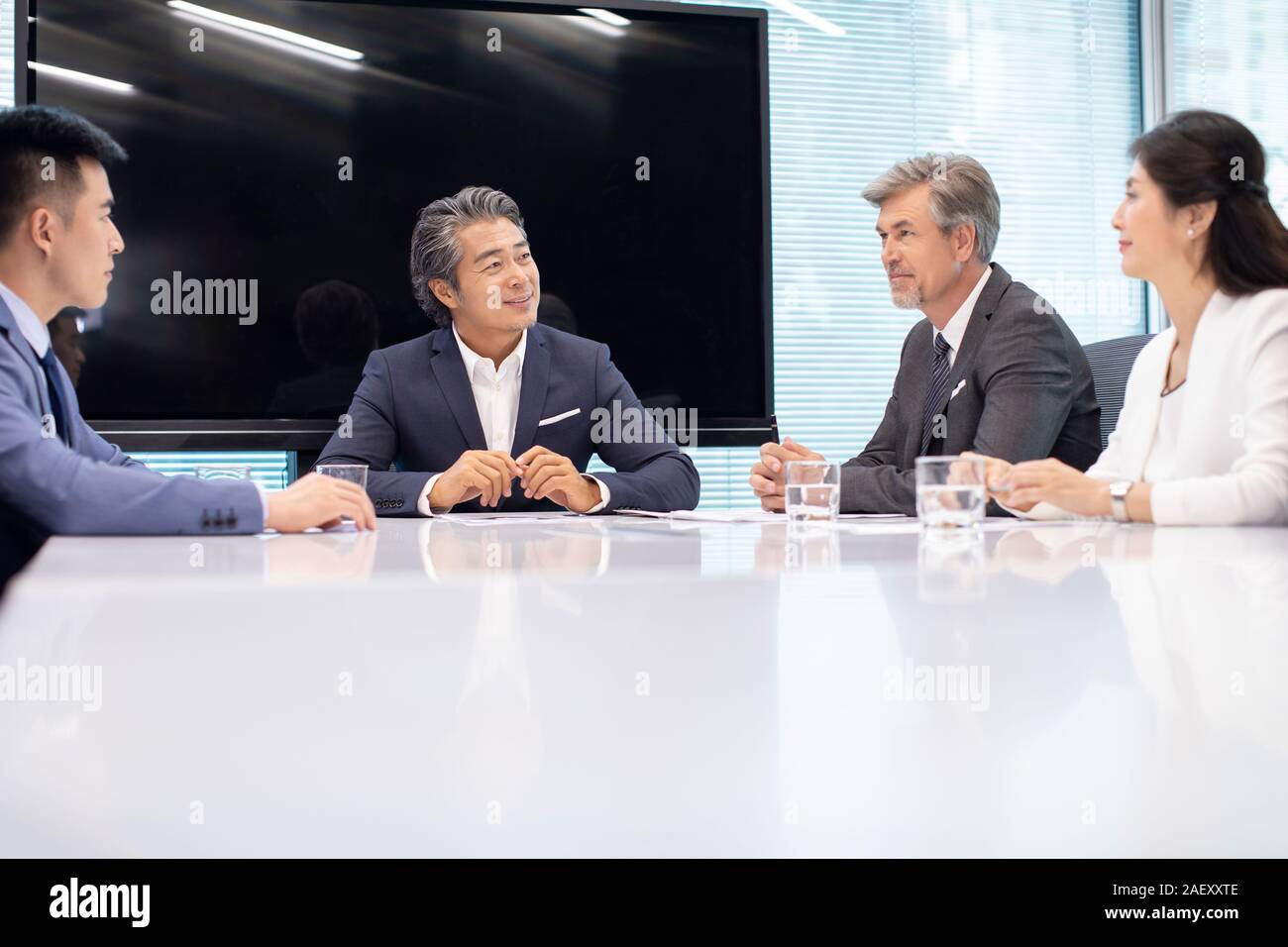 Business people talking in conference room Stock Photo - Alamy