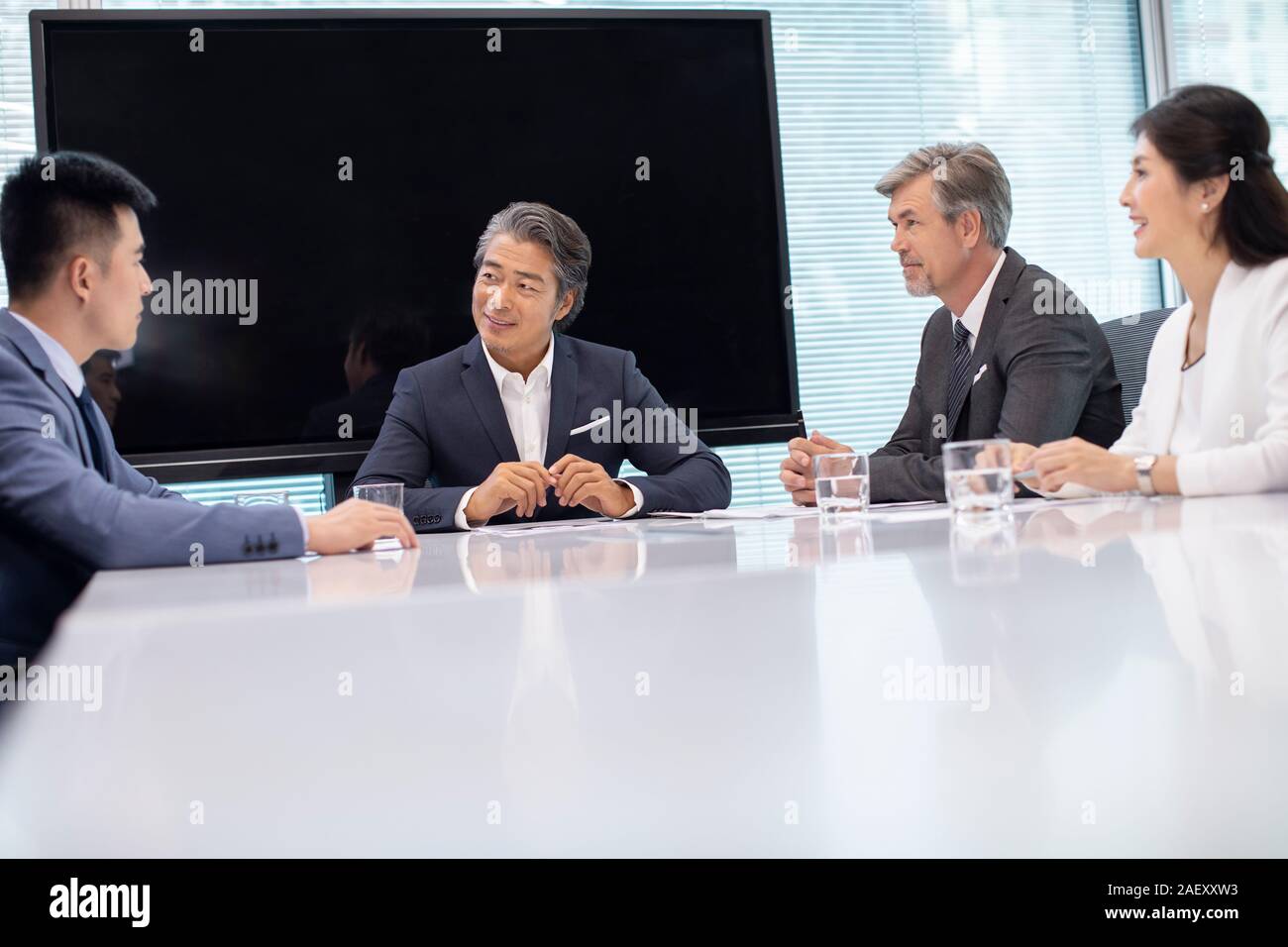 Business people talking in conference room Stock Photo - Alamy