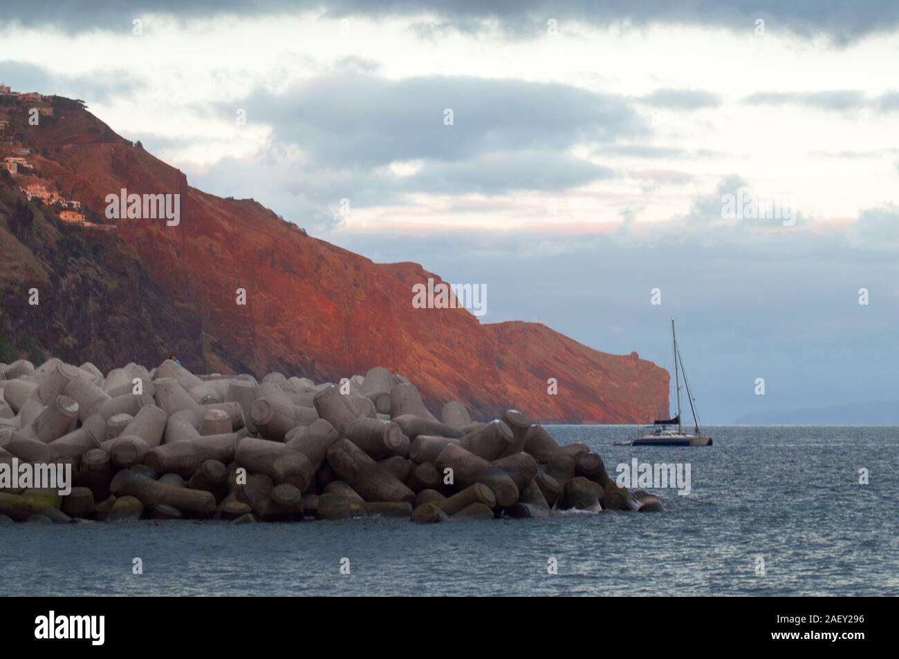 Volcanic cliffs of Madiera Island at sunset. View from Funchal Stock ...