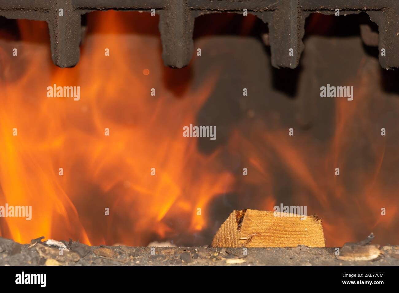 The fire burns in the stove winter home heating concept Stock Photo - Alamy