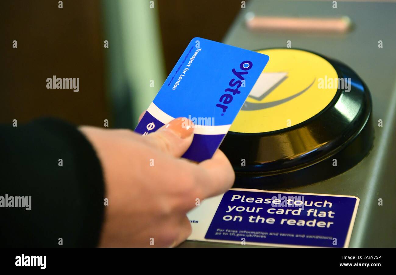 An Oyster card is used at a tube station in London Stock Photo - Alamy