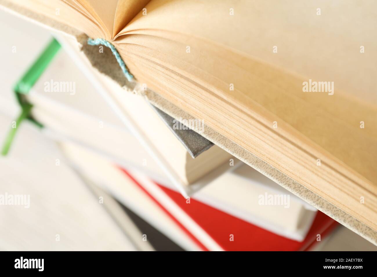 Stack of books, close up. Self development Stock Photo - Alamy