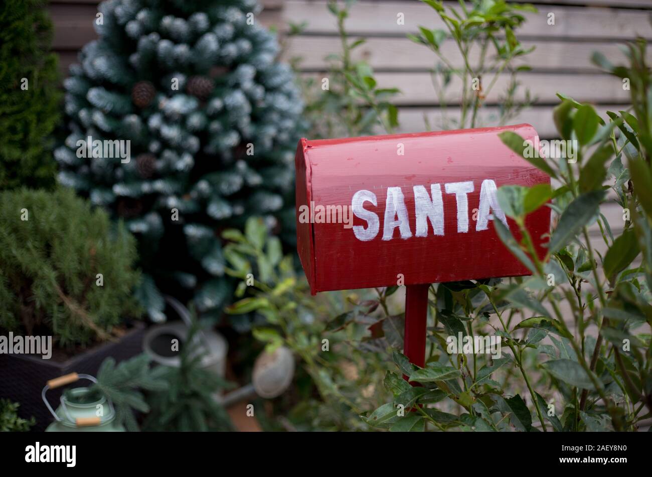 Christmas, red mailbox with letters to Santa Claus Stock Photo - Alamy