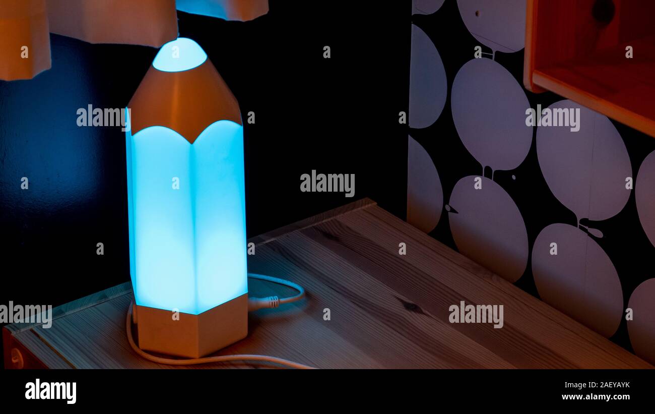 Pencil lamp. Children's light blue Stock Photo - Alamy