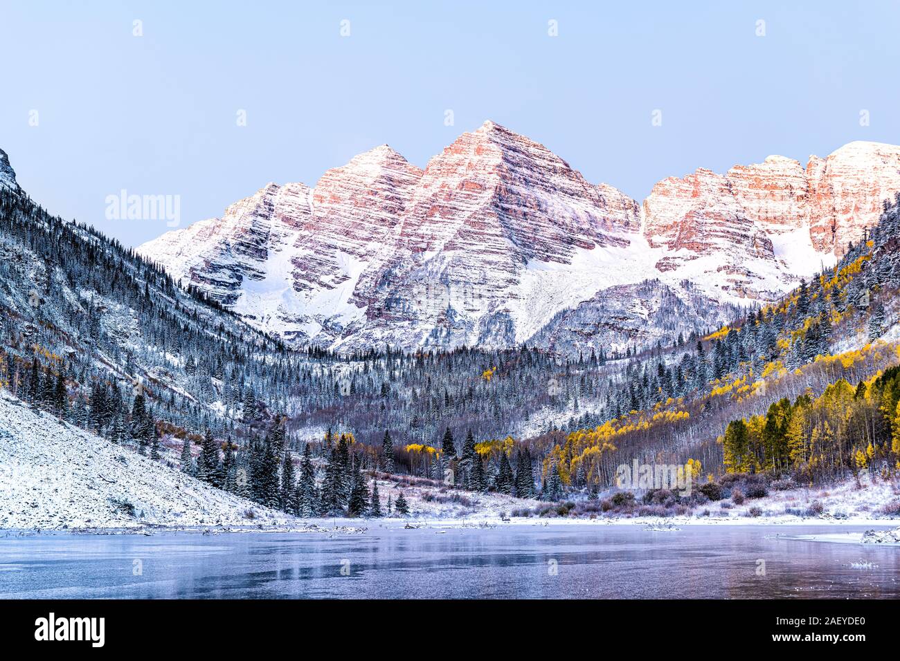 Maroon Bells morning sunrise with sunlight on peak in Aspen, Colorado ...