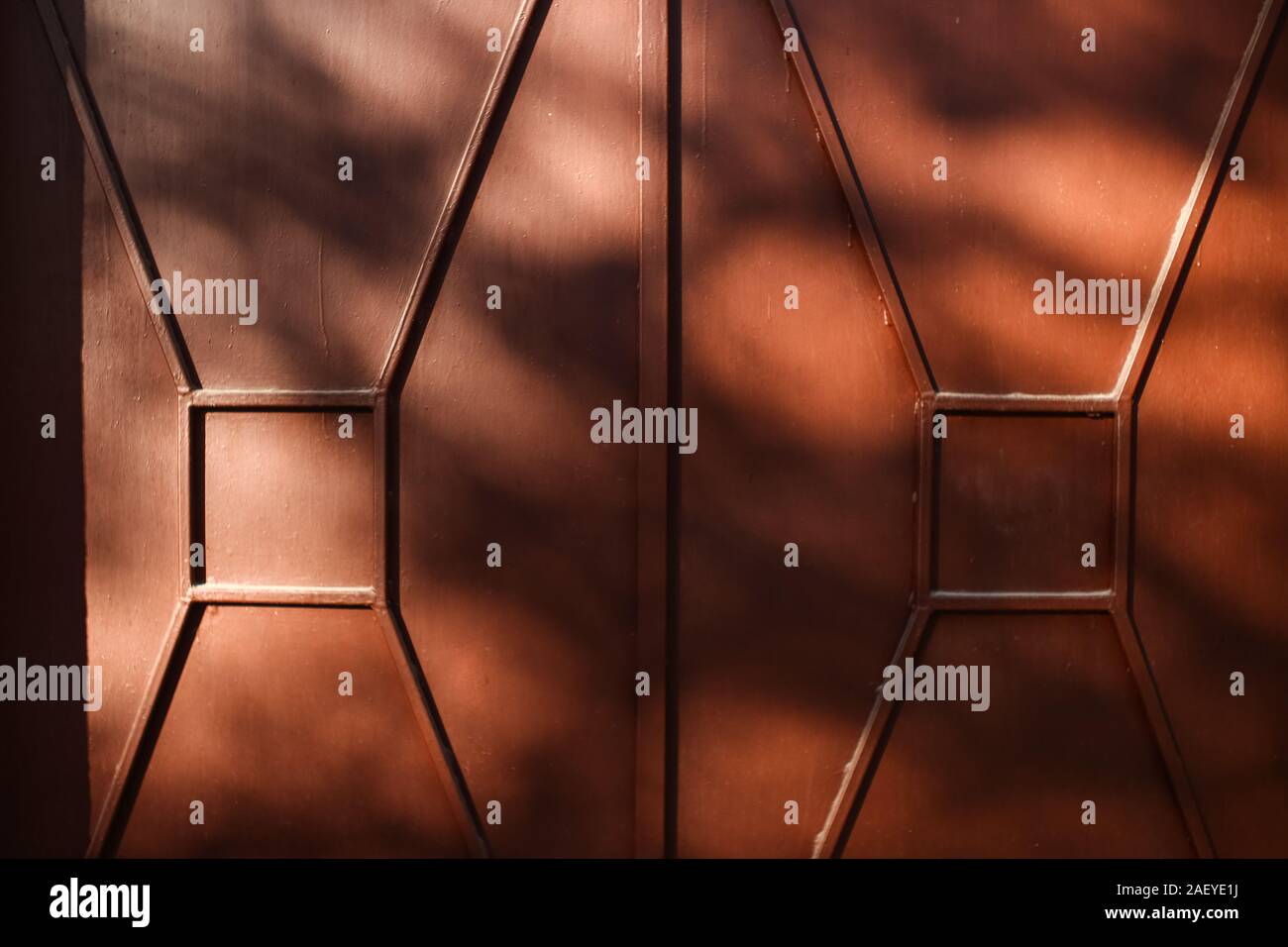 Abstract view on gate with sunlight and shadow Stock Photo - Alamy